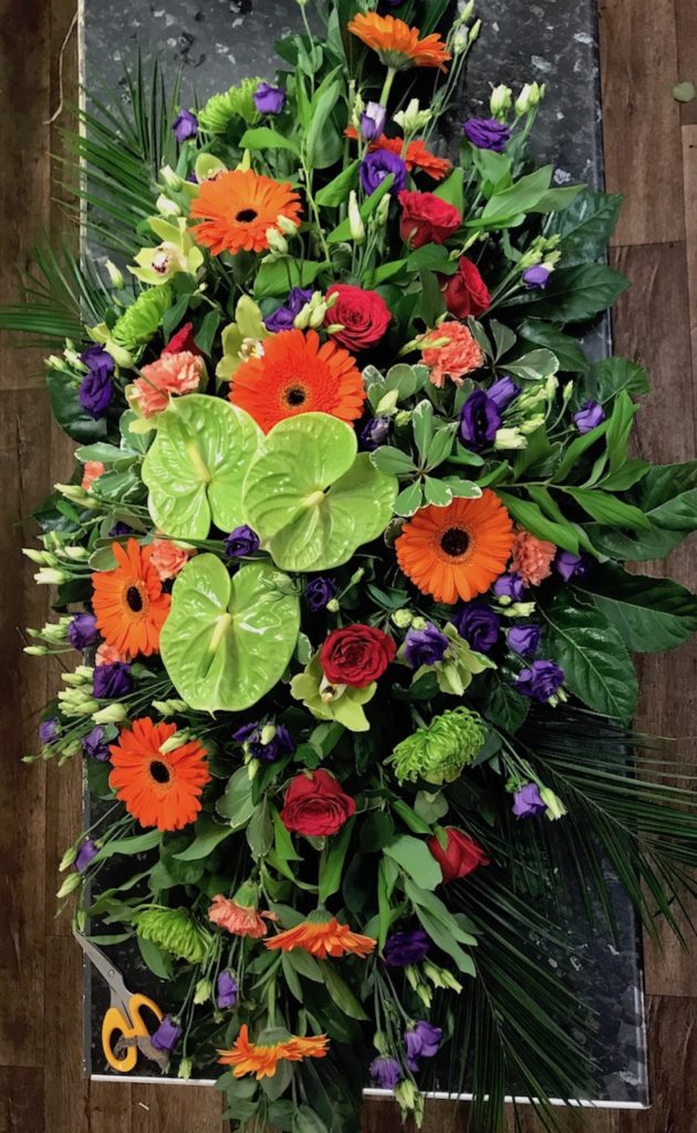 Vibrant Casket Spray - Welwyn Florist